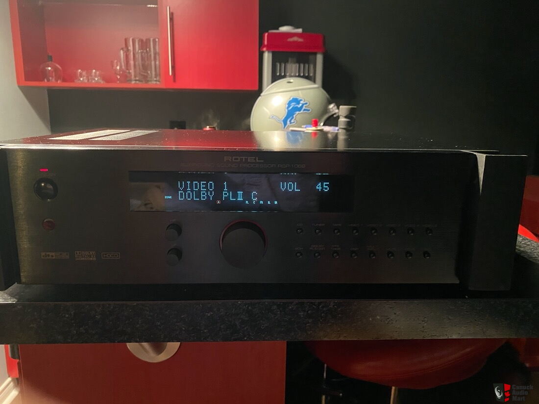 Rotel RSP-1068 processor, RMB-1075 amplifier, RR-1050 remote w ...